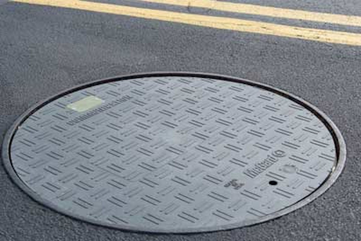 Locking manhole cover | WaterWorld